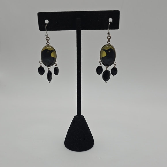 Hot Cakes | Jewelry | Hot Cakes Black And Gold Raven Drop Earrings ...